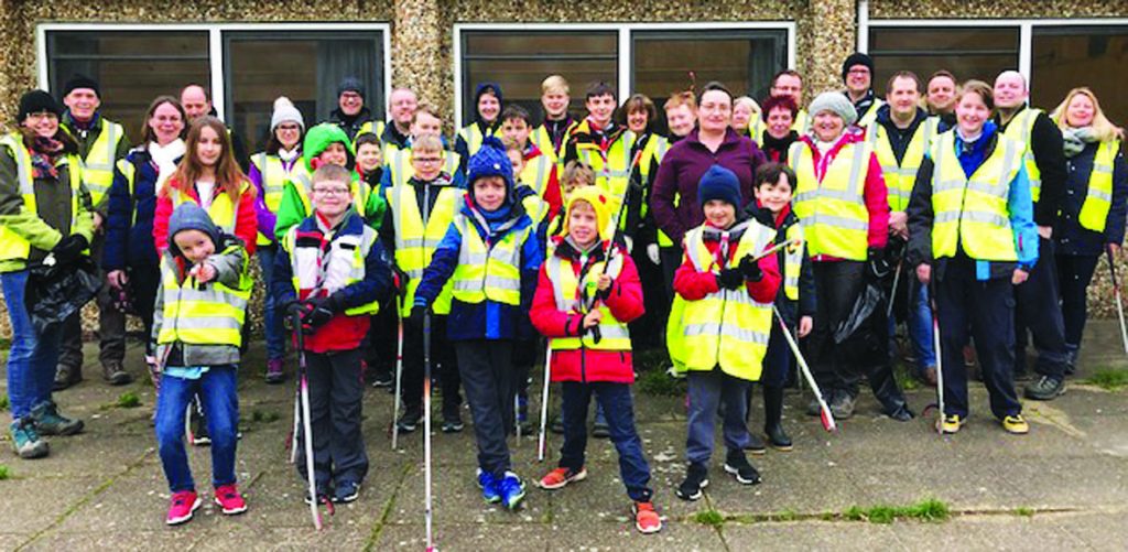 Scouts take to the streets for village's litter pick ...