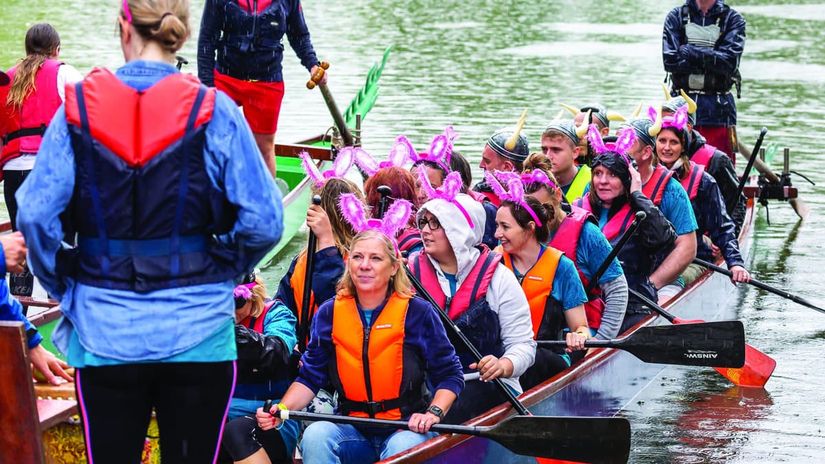 Action-packed spectacle of dragon boats racing in aid of Woking & Sam ...
