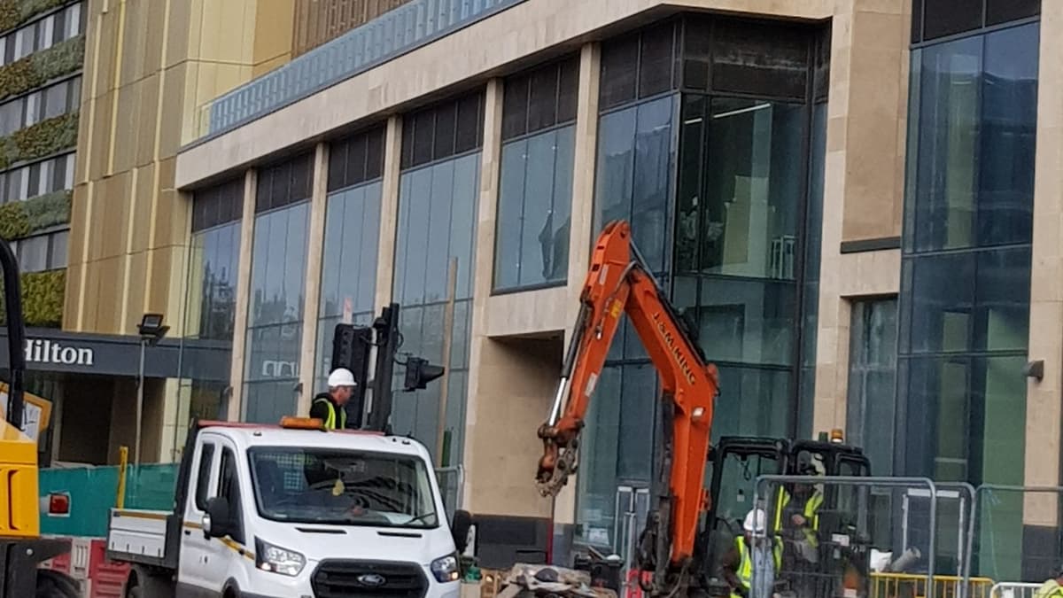 New Hilton Hotel won’t open until at least next October ...