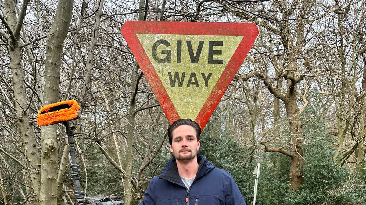 The Sign Guy gives back to the community by cleaning road signs ...