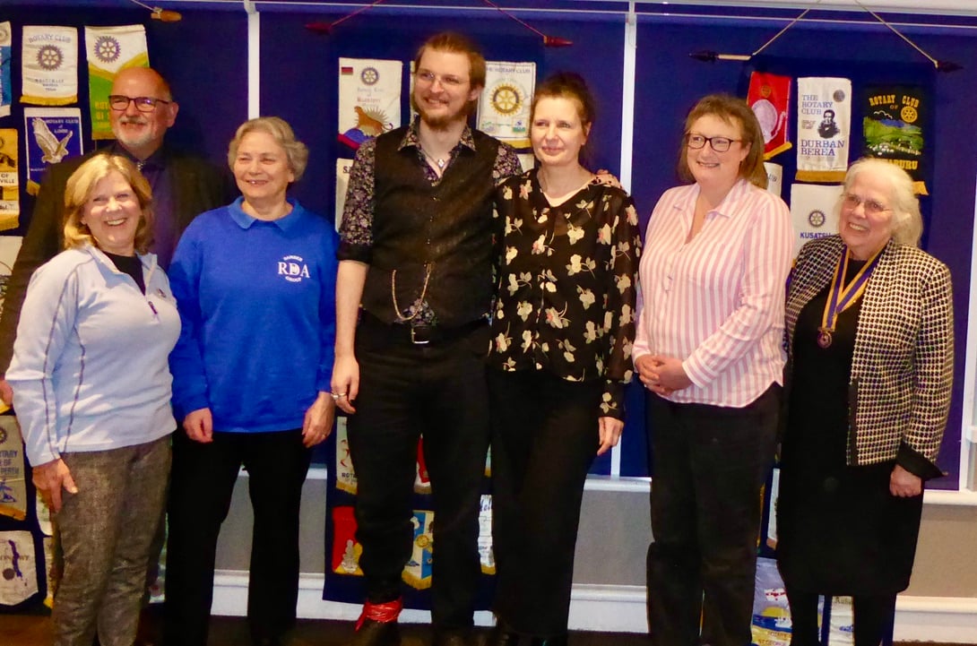 Woking Rotary Club donates Swimathon proceeds to local charities ...