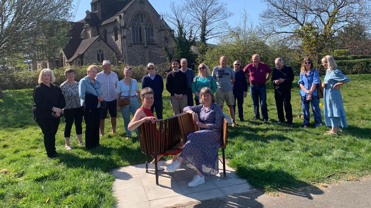 West Byfleet community comes together to unveil listening bench ...