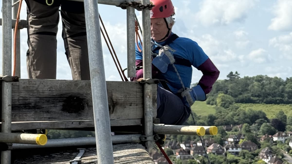 Bishop takes a leap of faith in sky-high fundraiser for Guildford ...